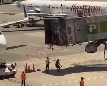 Father And Son Run Down Jetbridge And Chase Their Plane After Missing ...
