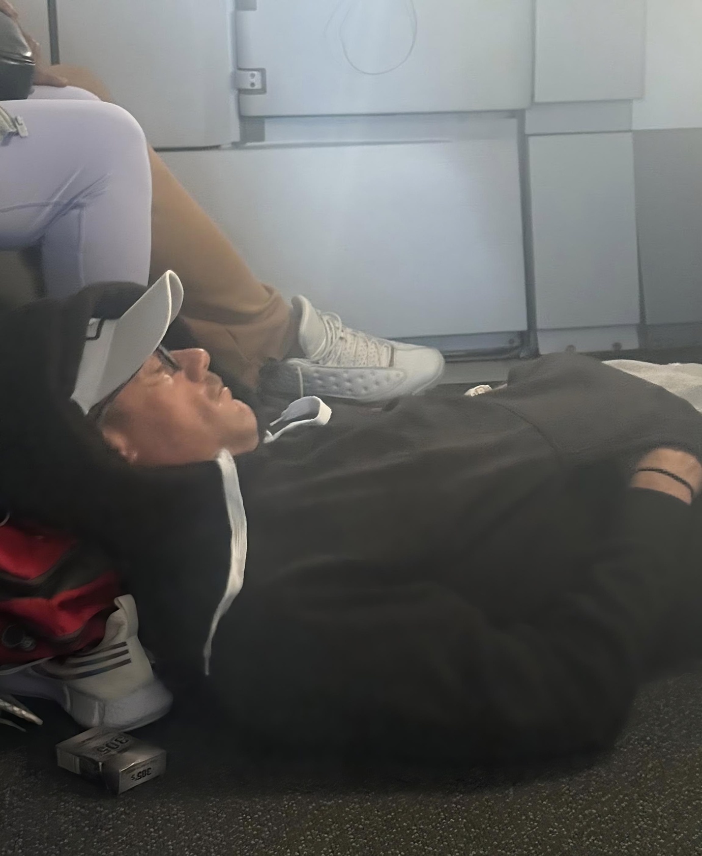 Economy Flat Bed On The Airbus A321 Floor—Passenger Blocks Exit Row, Crew Shrugs ‘Cool, Cool ...